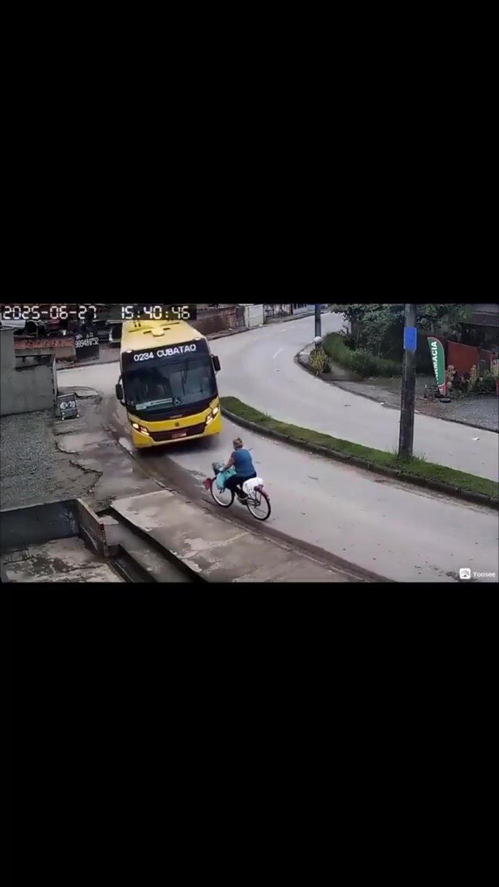 Cyclist Takes On A Bus