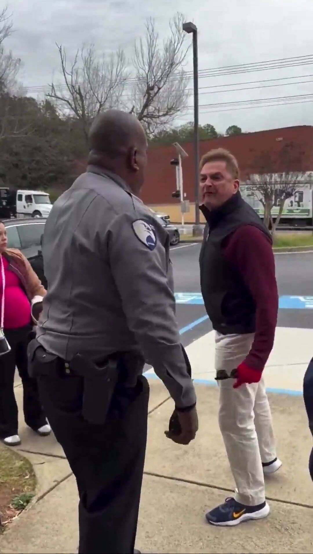 Angry Racist White Man Versus A Calm Black Security Guard